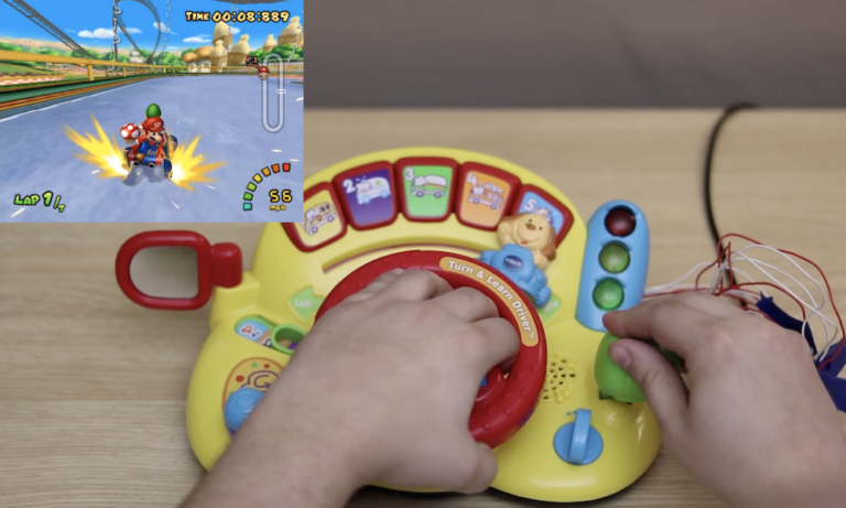 Play Mario Kart: Double Dash with a hacked VTech steering wheel ...