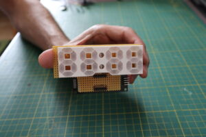 This clock tells time on a photochromic display | Arduino Blog