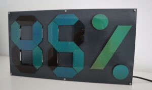 This thermochromic 7-segment display colorfully shows the temp and ...