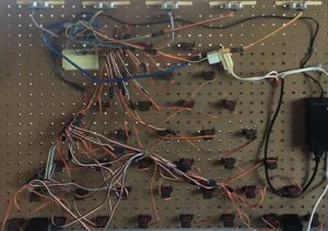 Three dozen servos create animated artwork | Arduino Blog