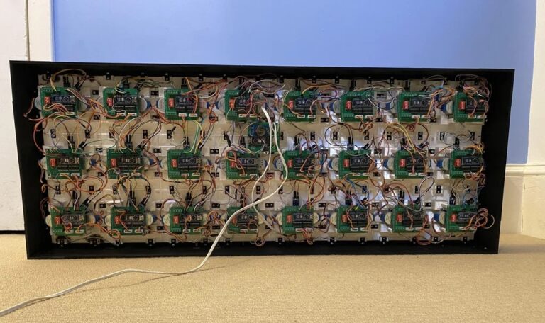 This Digital Clock Uses 24 Arduino Controlled Analog Faces Arduino Blog