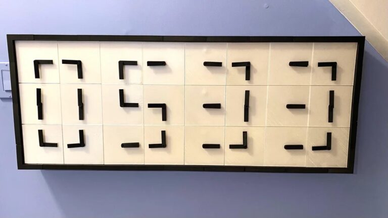 This digital clock uses 24 Arduino-controlled analog faces | Arduino Blog