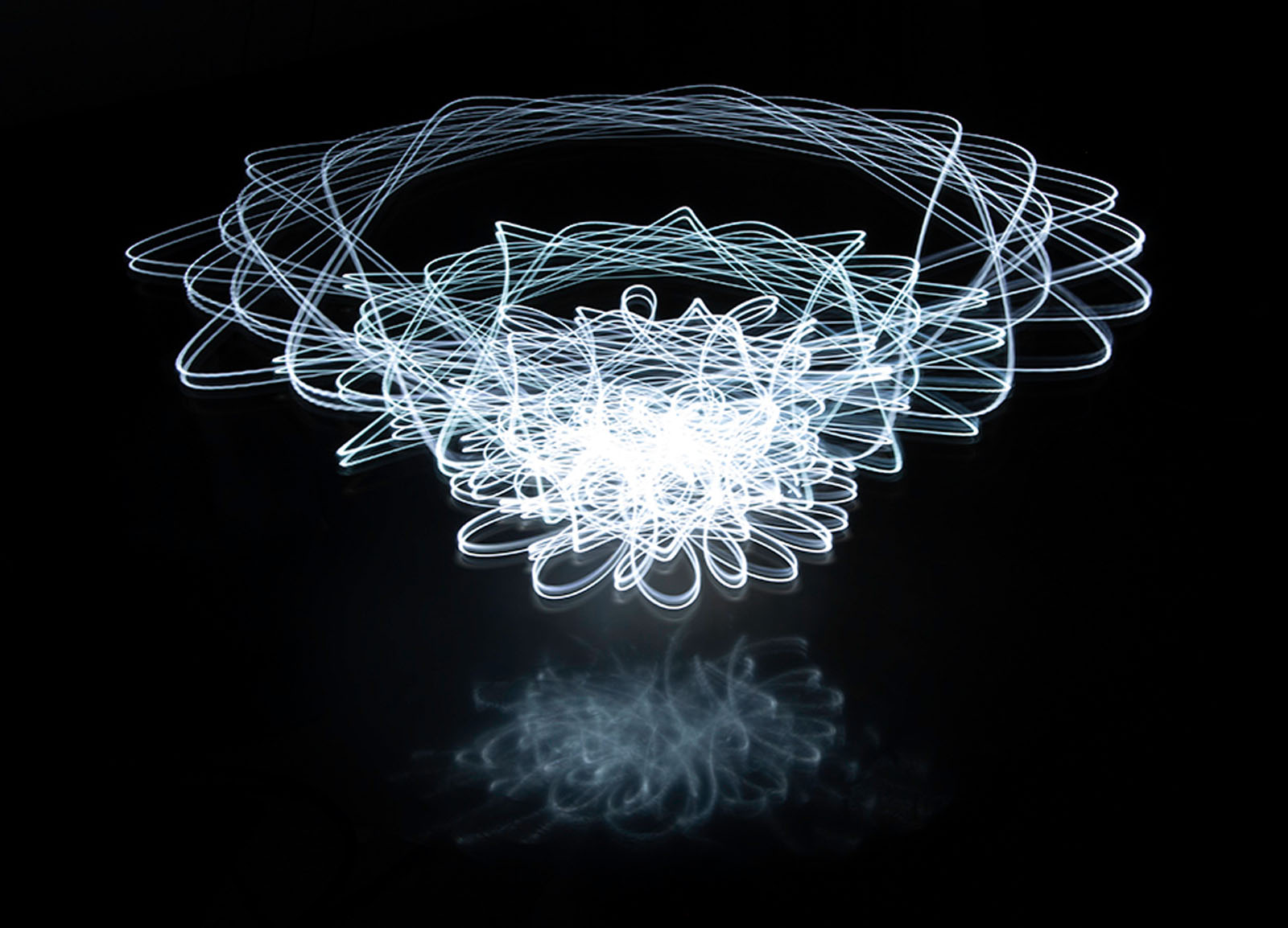 This light painting machine puts a new spin on the old geometric chuck ...
