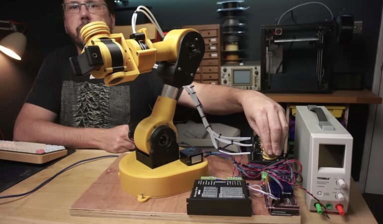 Increase a robot arm’s payload capacity by relocating its wrist motors ...