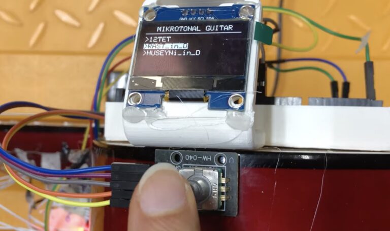 This mod tunes the guitar so you don't have to | Arduino Blog