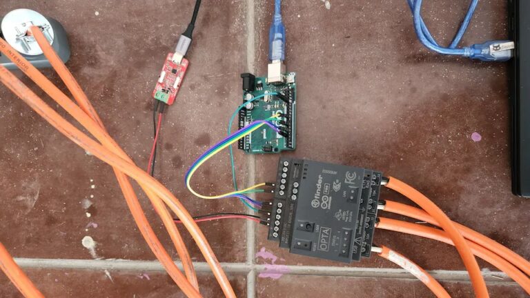 Syncing tunes to Christmas tree lights with the Arduino Opta | Arduino Blog