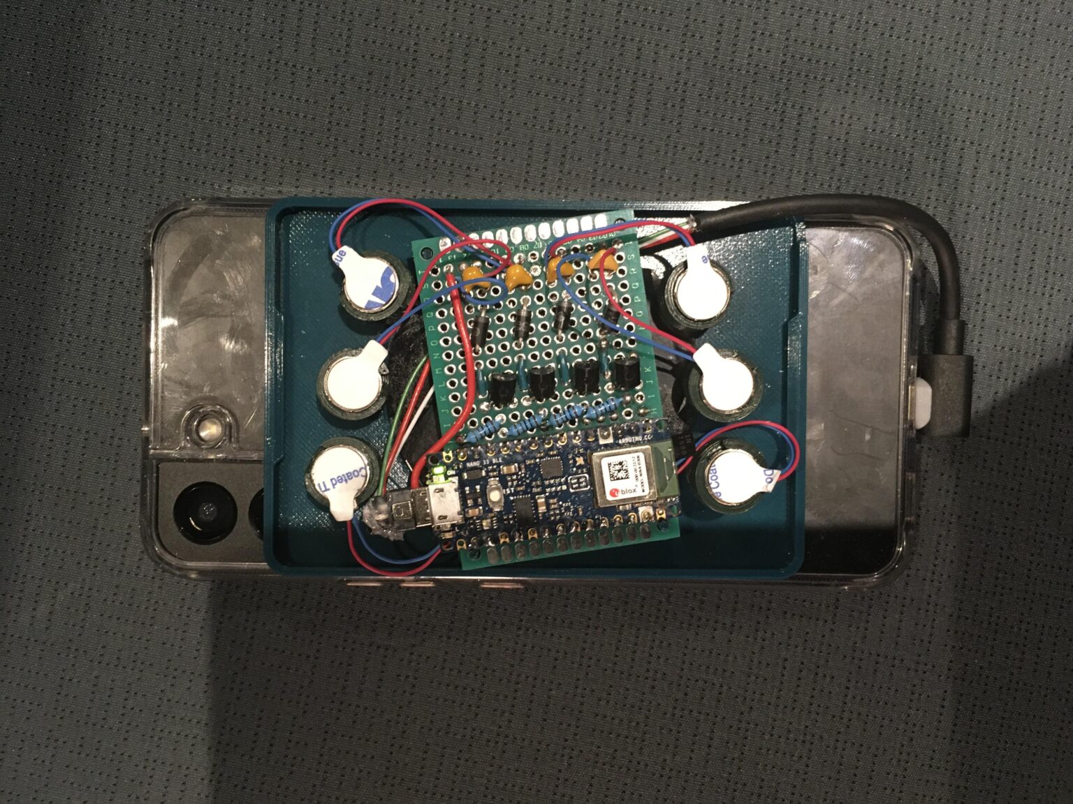 This small device enables users to feel braille through haptics ...