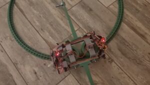 This miniature monorail stays upright with the help of gyro ...