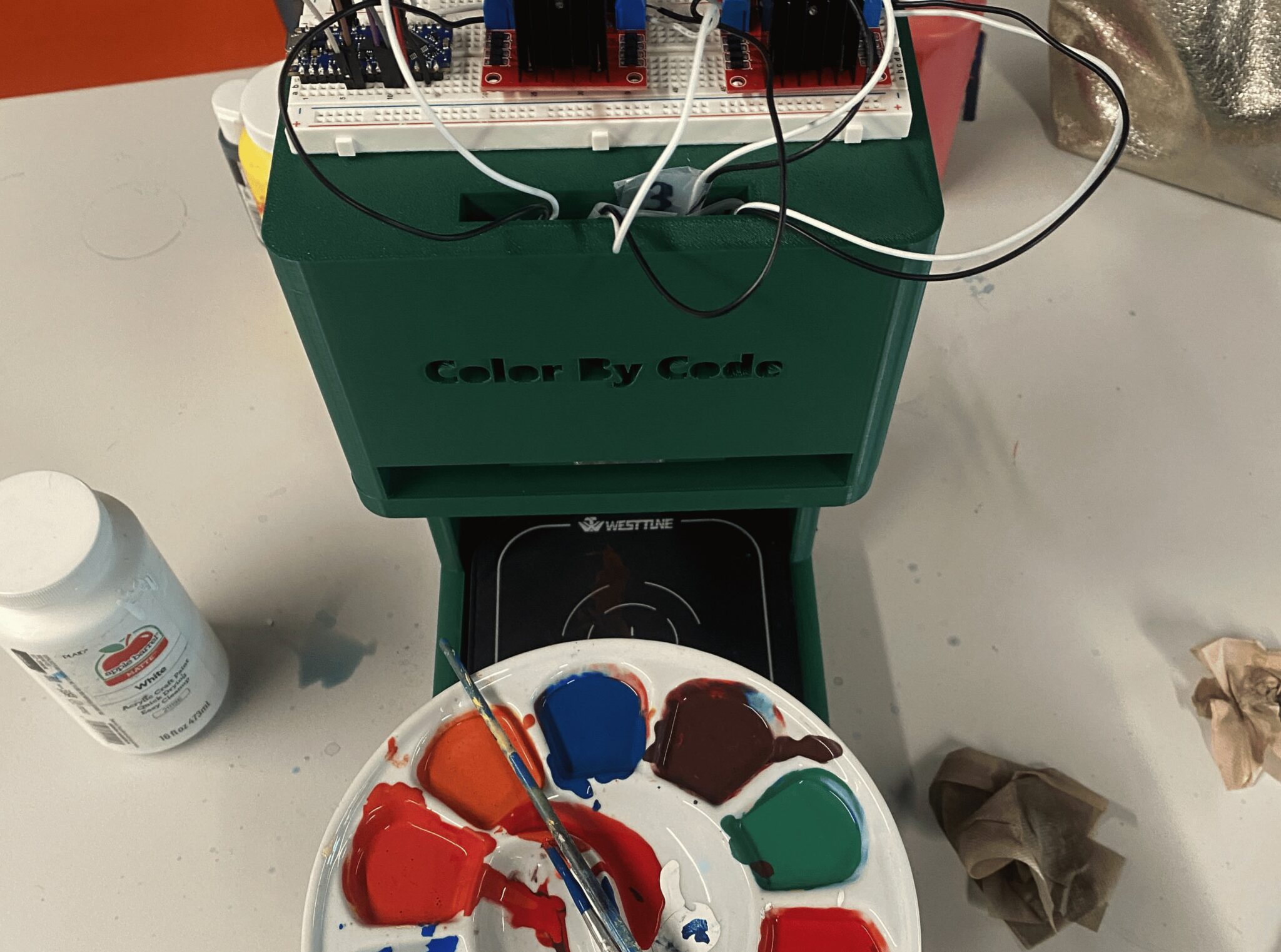 This Arduino Nano Every-controlled machine automatically mixes acrylic paint of any color ...