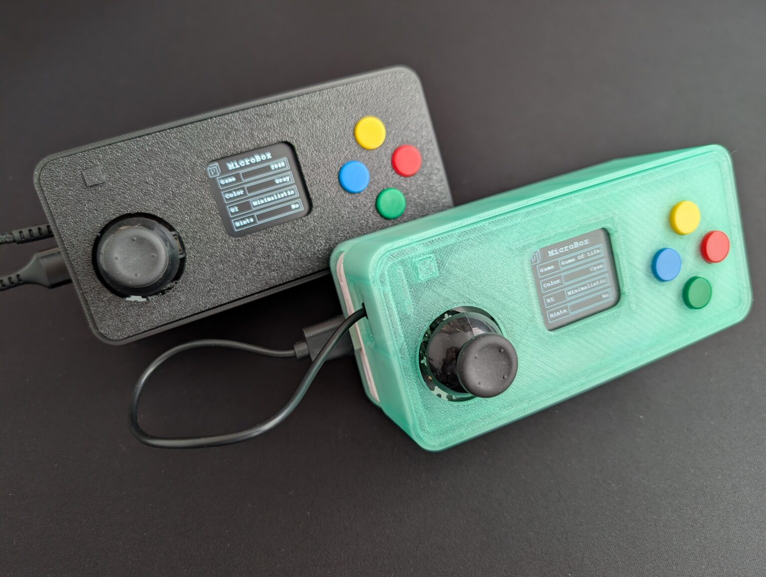 The MicroBox is a handheld game console that runs on an Arduino UNO R4 ...
